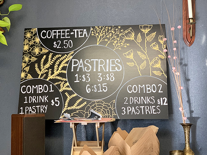 The artfully chalked menu board offers combo deals that feel like stealing. When pastries look this good, even the prices deserve artistic presentation.