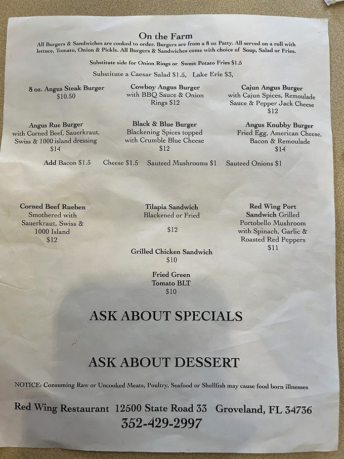 The menu reads like a love letter to comfort food – burgers named after cowboys and sandwiches that promise to satisfy even the most discerning appetite.
