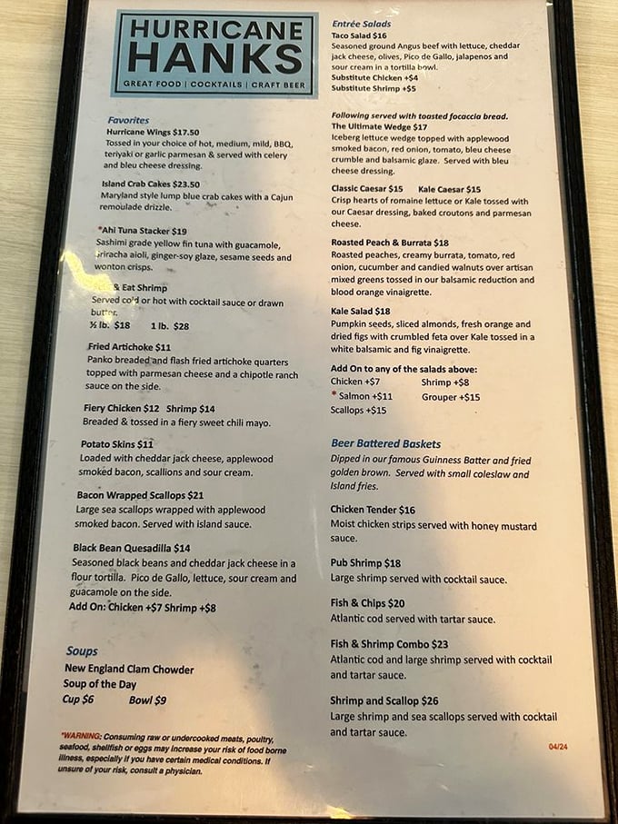 The menu reads like a love letter to seafood lovers—just try not to drool on it while deciding between Island Crab Cakes and Bacon Wrapped Scallops.