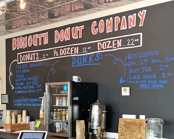 The chalkboard menu wall—a masterpiece rivaling anything in the Louvre—showcases the day's treasures in vibrant, handwritten glory.