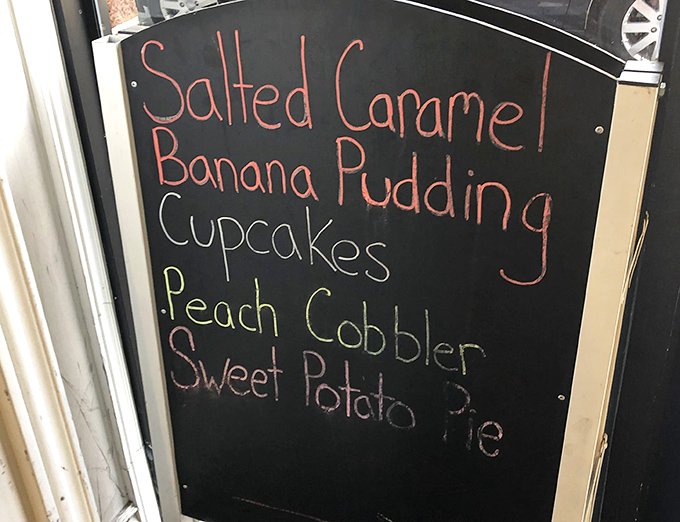 The chalkboard menu reads like a love letter to comfort food classics. That salted caramel banana pudding isn't just a dessert—it's an experience worth crossing state lines for.
