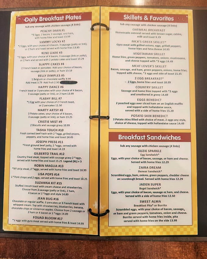 The menu at Nick's isn't just reading material—it's a spiral-bound book of possibilities that might require your "restaurant glasses."