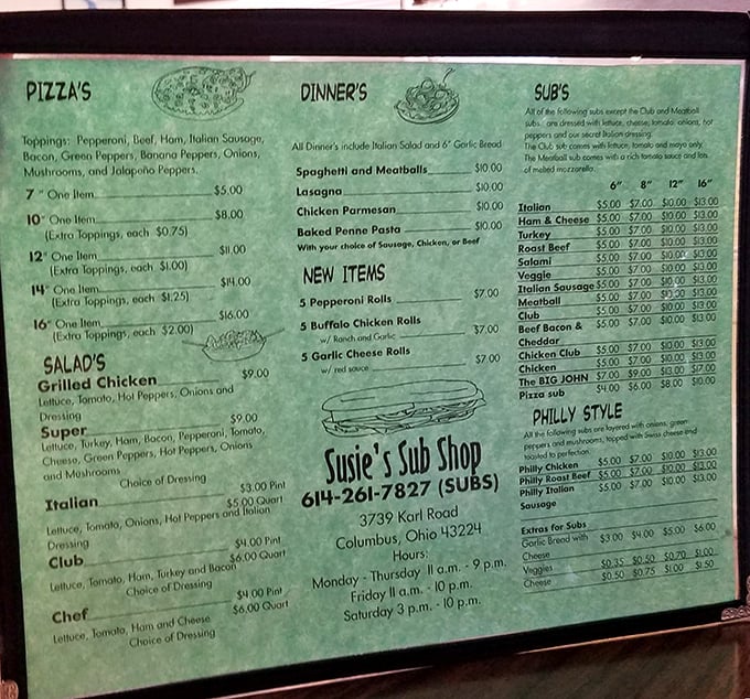 This mint-green menu board is a roadmap to happiness, with the sub section clearly stealing the spotlight. Choose your adventure wisely!