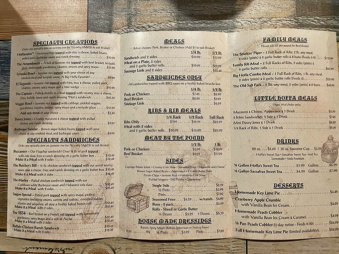 This menu isn't just a list of food—it's a treasure map to smoked meat paradise, complete with gangster-themed specialties that'll make your taste buds an offer they can't refuse.