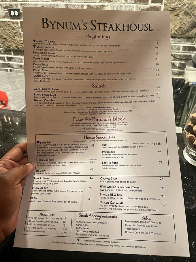 The menu reads like poetry to carnivores—"Proud Rib" and "Sheer heaven in meat tender cut of beef" aren't just descriptions, they're solemn vows.