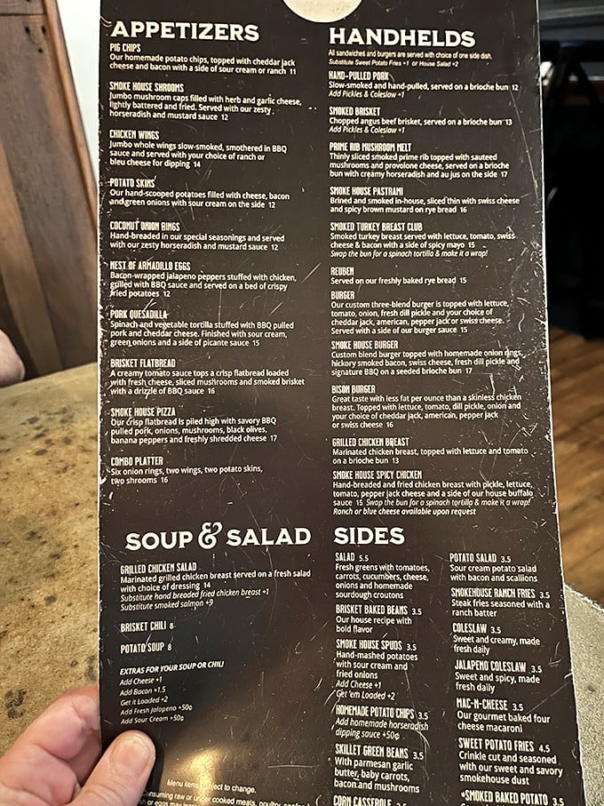 A menu that reads like a love letter to smoked meats. Choosing between Armadillo Eggs and Brisket Flatbread might be the hardest decision you'll make all week.