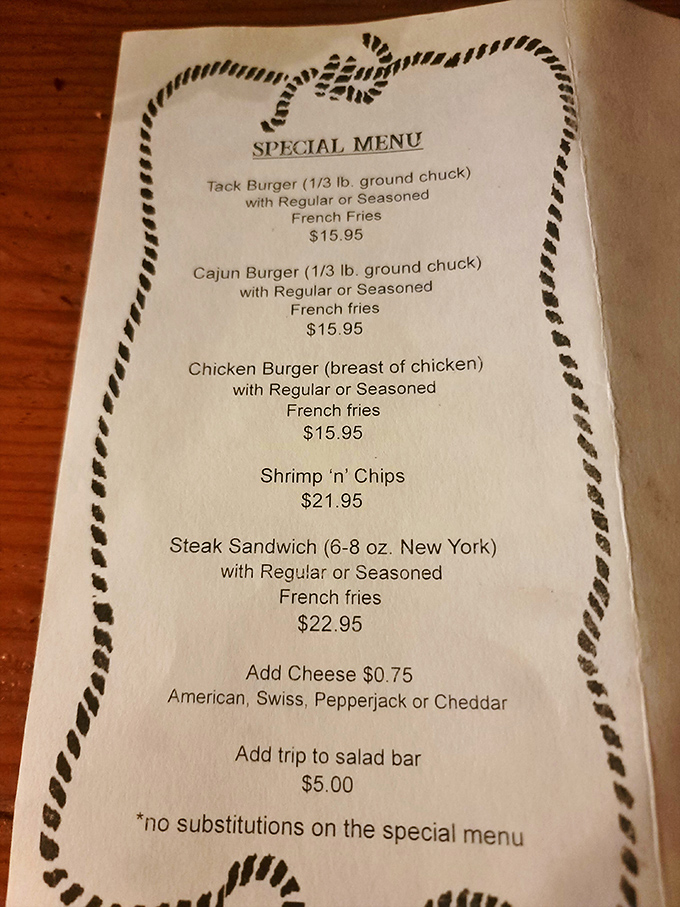 A menu bordered with rope design—simple, straightforward offerings that promise substance over flash. The steak sandwich is calling my name.