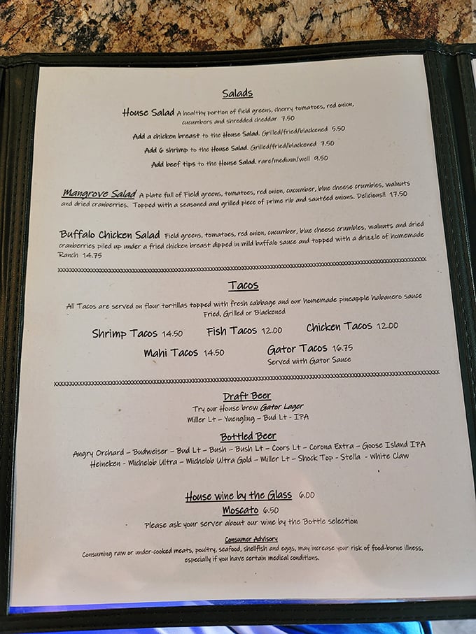 The menu tells the real story—gator tacos served with homemade pineapple habanero sauce. This isn't tourist food; it's Florida's soul on a plate.