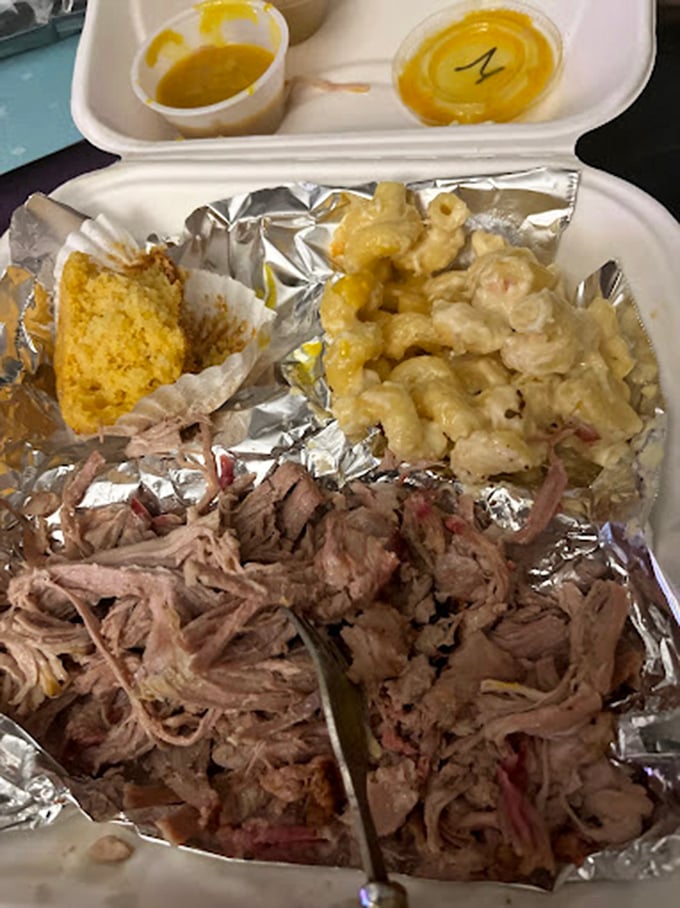 Pulled pork so tender it practically surrenders to your fork. This isn't just meat—it's a smoky love letter to patience.