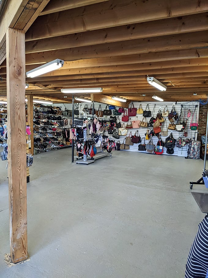Handbag heaven! The wall display showcases everything from everyday totes to designer clutches, each waiting for its second chance at fashion stardom.