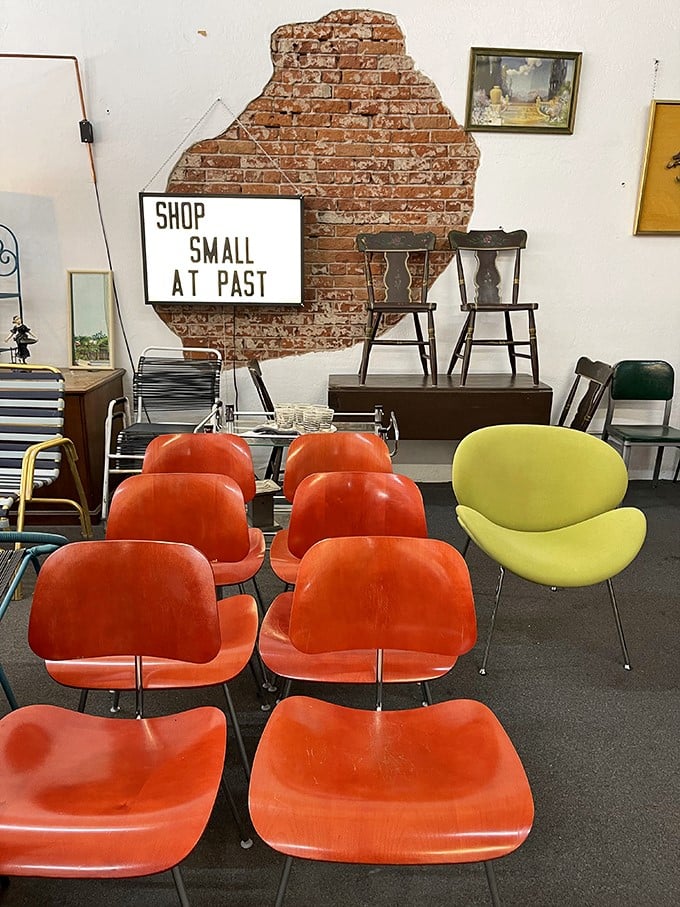 Mid-century modern heaven! These vibrant orange chairs aren't just seating – they're time machines to an era when design had personality and flair.