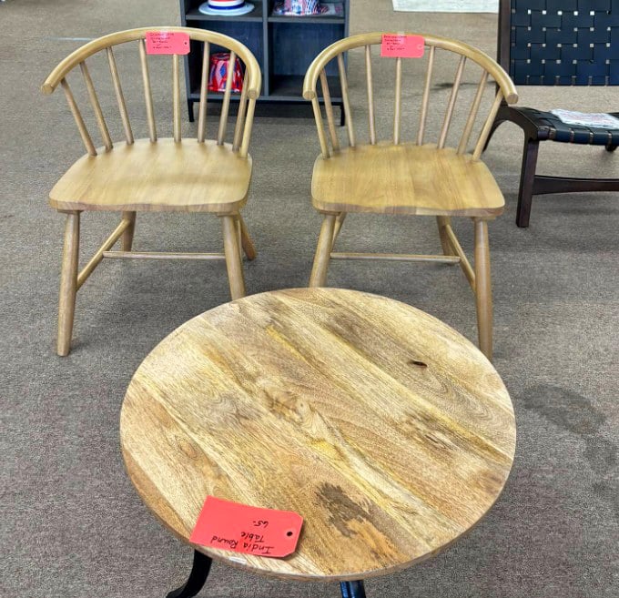 Mid-century charm meets modern budget – these wooden chairs and table are just waiting to host your next dinner party or morning coffee ritual.