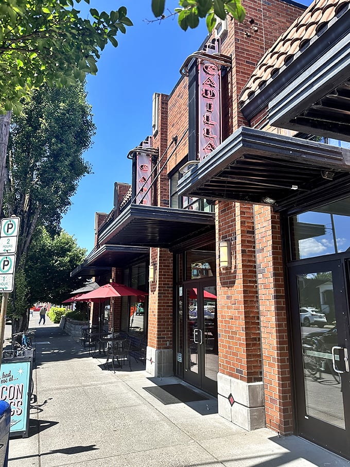 Cadillac Cafe's brick facade and outdoor seating whisper "stay awhile" – a breakfast sanctuary amid the urban bustle.