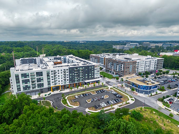 Columbia's modern apartment complexes rise from lush greenery, offering contemporary living spaces at prices that won't require a second mortgage.