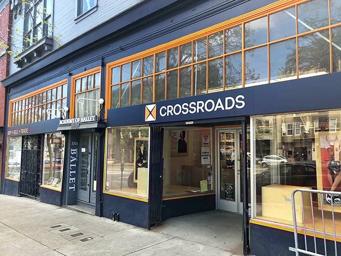 Crossroads Trading's distinctive blue storefront with golden windows—where fashion gets its second act with star billing.