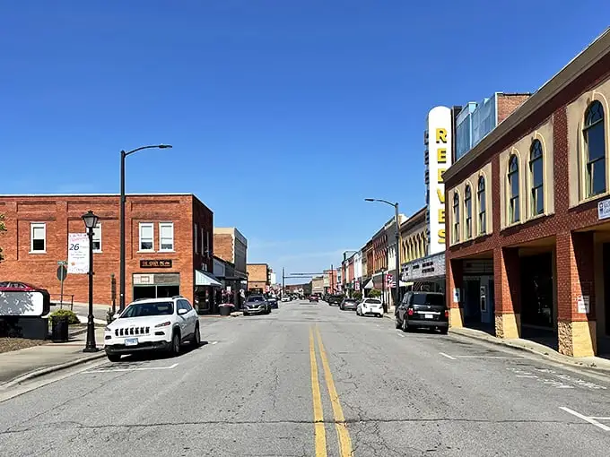 Elkin's sun-drenched downtown invites leisurely window shopping without breaking the bank. Brick buildings, blue skies, and budget-friendly living!
