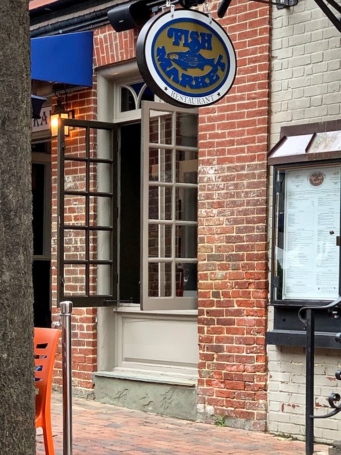 Fish Market Restaurant's classic brick facade and vintage sign promise seafood traditions that have stood the test of time.