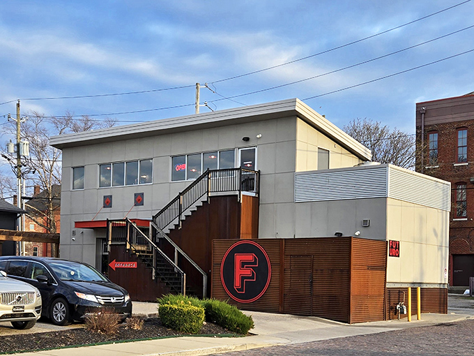 Futuro's sleek, modern facade is architectural misdirection – who knew pizza paradise hid behind such minimalist design?