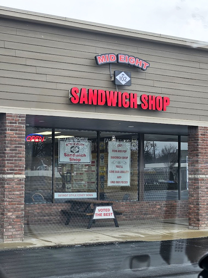 Mid Eight's simple storefront hides sandwich greatness – that "Voted The Best" sign isn't just wishful thinking!