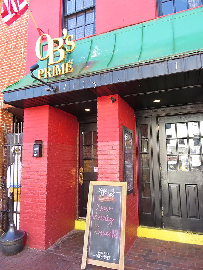 OB's Prime's vibrant red brick exterior and emerald awning create the perfect first impression—like a gift waiting to be unwrapped.