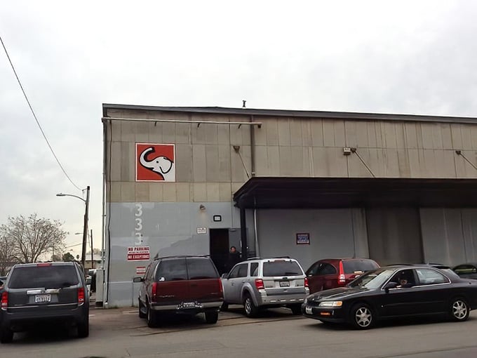 The White Elephant Sale's humble exterior hides a wonderland inside – like finding Narnia in a warehouse with better vintage furniture.