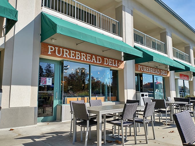 PureBread's modern storefront with outdoor seating invites you to linger. Sandwich sophistication meets Delaware charm!