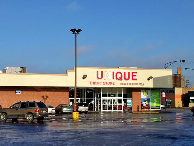 Unique Thrift Store lives up to its name with a rainbow-colored sign promising affordable adventures inside.