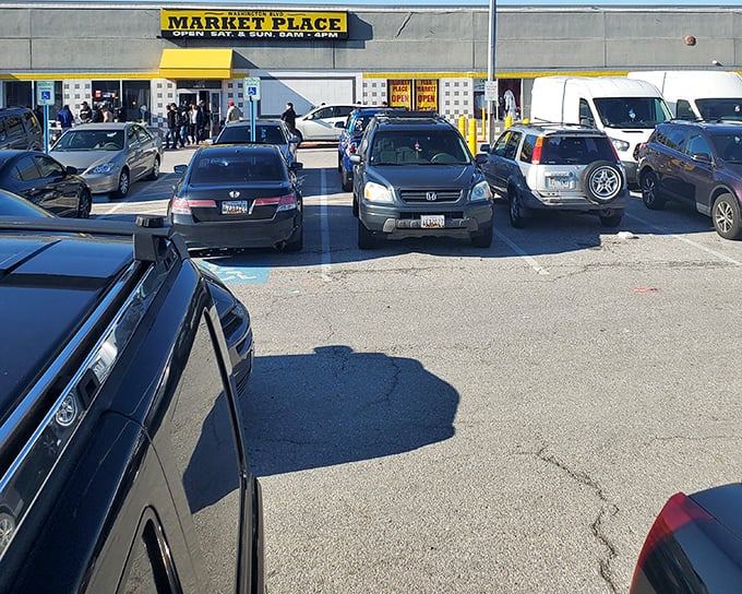 Washington Boulevard Marketplace's bright yellow sign is like a beacon for deal-seekers – "Bargains ahead, captain!"