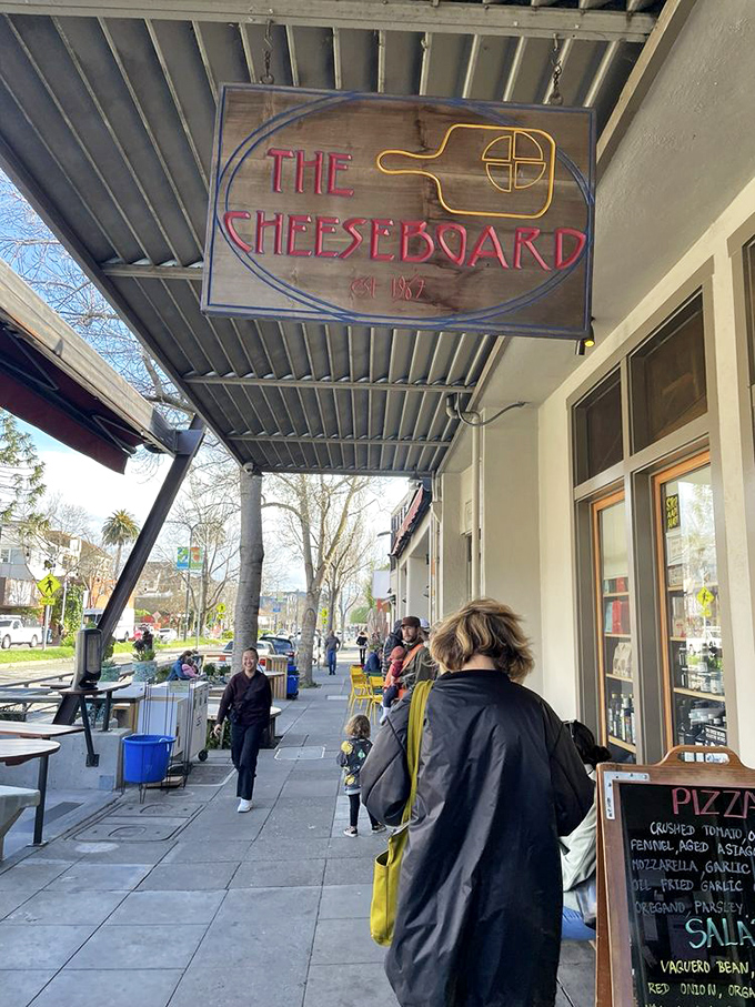 Beneath The Cheese Board’s iconic sign, jazz meets pizza in perfect harmony. Its daily creations inspire lines that have become part of Berkeley’s cultural fabric.