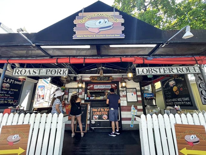 That happy clam knows something – probably that the lobster rolls here are worth the wait.