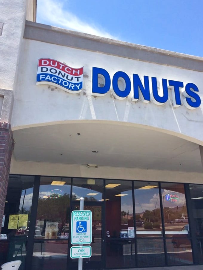 The blue lettering practically pops against the white facade. Dutch Donut Factory doesn't need flashy signs when the donuts speak volumes.