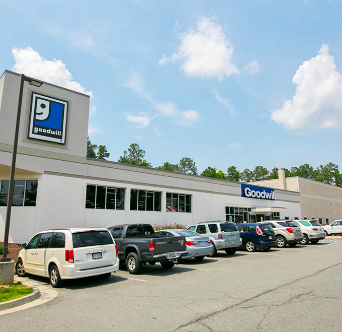 The parking lot's full for good reason—this isn't your grandmother's Goodwill experience.