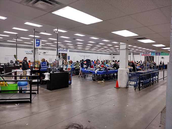 Inside the Clearance Center, blue bins become magical portals to bargains sold by the pound.