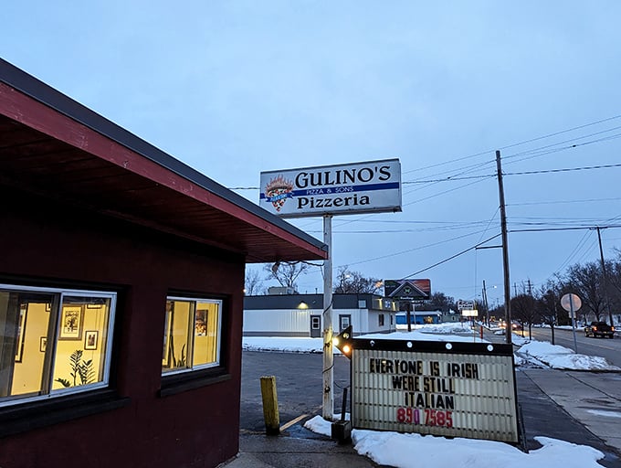 "Everyone is Irish, we're still Italian" – Gulino's playful sign perfectly captures the welcoming spirit of this Bay City pizza institution.