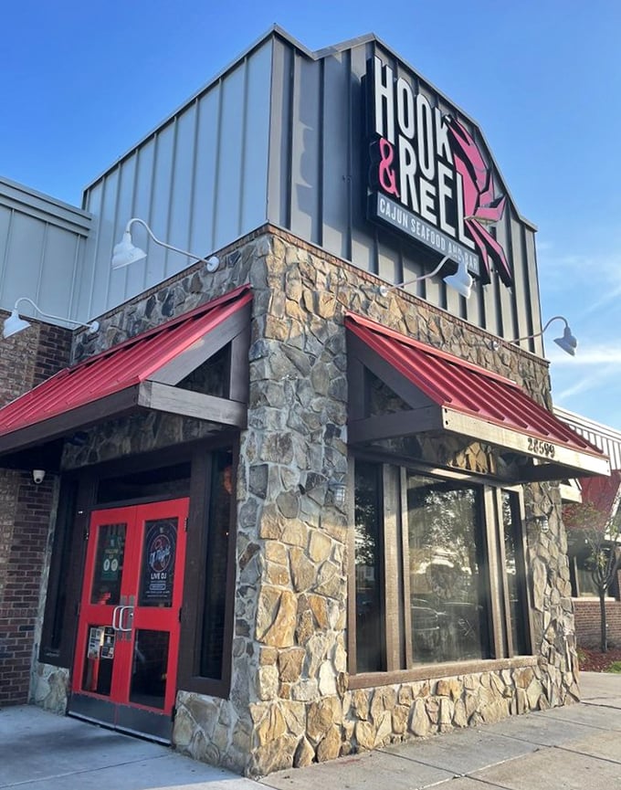 Red doors, red awnings—Hook & Reel isn't subtle about its passion for seafood. This Livonia spot brings Louisiana heat to Michigan.