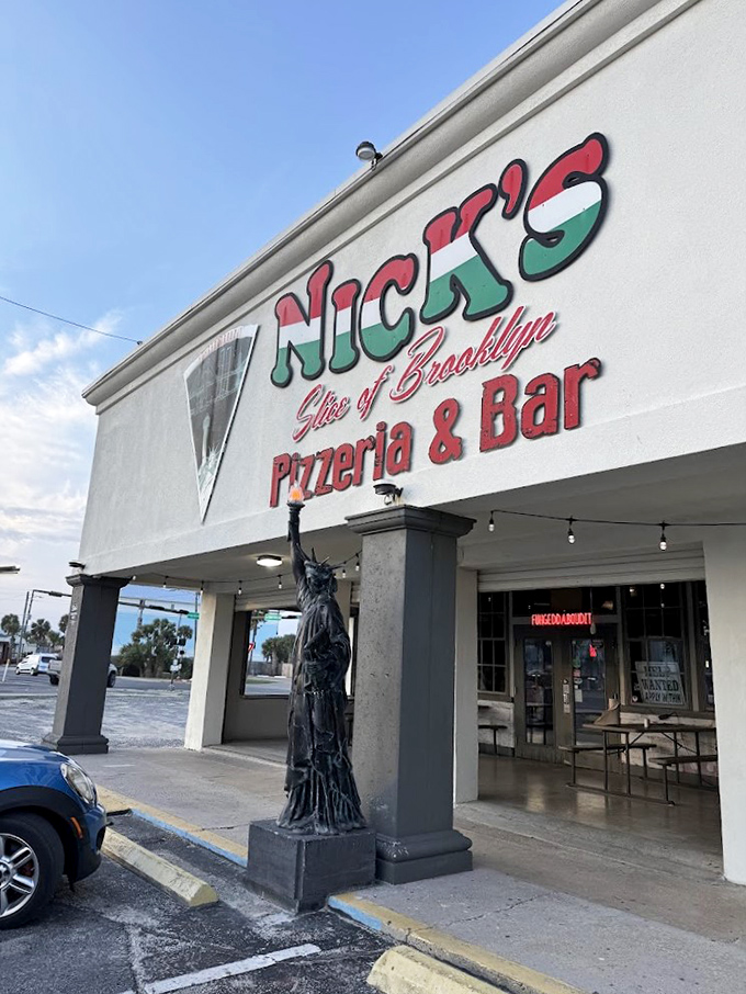 Lady Liberty stands guard over authentic New York slices in the Florida panhandle.