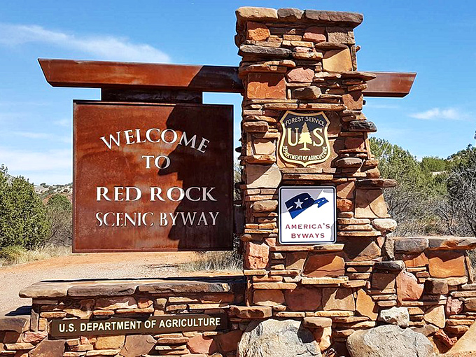 The Red Rock Scenic Byway welcomes you with this rustic sign – the doorway to Arizona's most photographed natural art gallery.