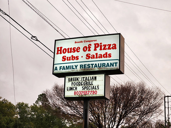 "A Family Restaurant" indeed – this roadside sign promises Greek-Italian comfort food that's stood the test of time.