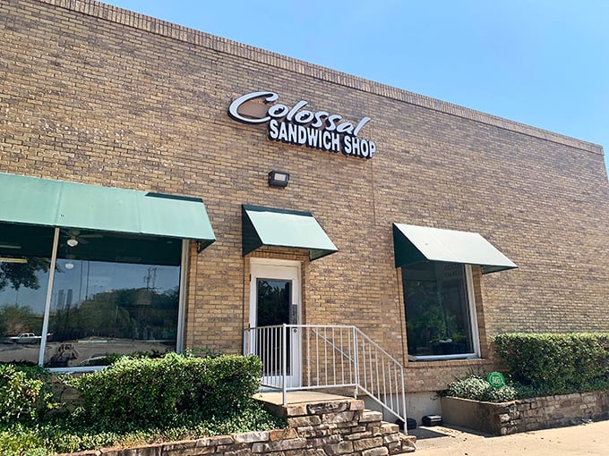 Green awnings and yellow brick—Bedford's best-kept secret serves sandwiches that truly live up to the "colossal" name.