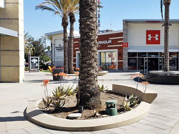 Under Armour's sleek storefront at The Outlets at Orange – where athletic wear meets fashion sense at prices that won't make you sweat.