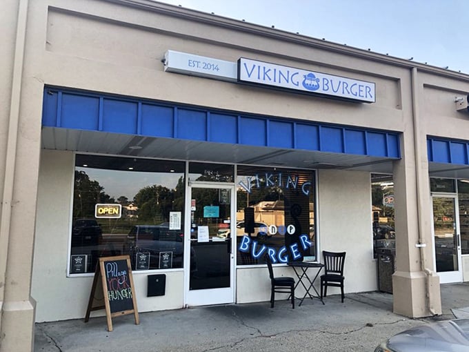 Viking Burger keeps it simple with a clean storefront and "OPEN" sign. The real drama happens on your plate, not in the décor.