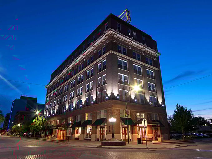 The beautifully lit buildings of Wichita Falls glow against the evening sky—classic architecture meets modern charm in this downtown gem.