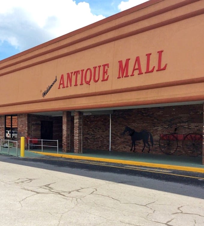 The red lettering promises antiques, but what you'll really find is a time machine disguised as a shopping experience.