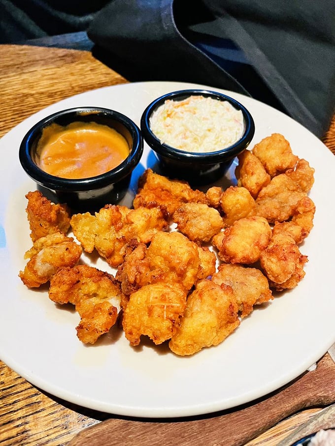 Golden-fried alligator bites—because sometimes adventure comes in bite-sized portions. Crispy, tender, and proof that everything tastes better with dipping sauce.