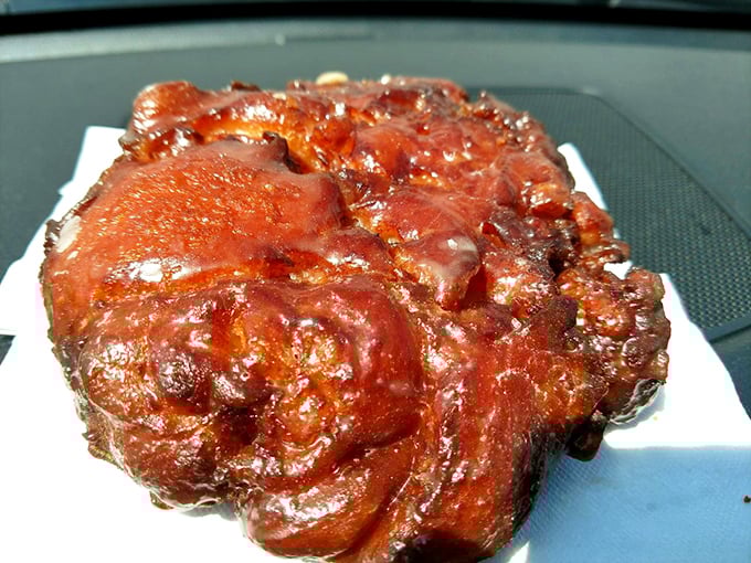 Behold the apple fritter in all its glistening glory! Crispy exterior, tender apple-studded interior – this is what breakfast dreams are made of.