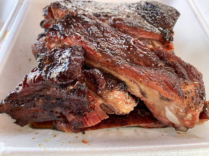 These ribs don't just fall off the bone—they practically leap into your mouth, their smoke ring a beautiful pink badge of honor.