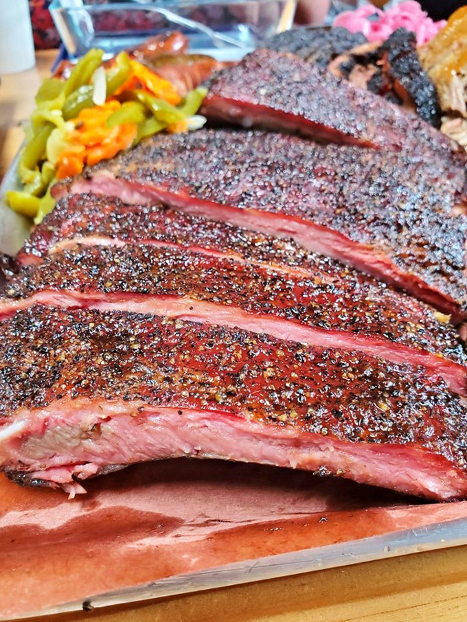 Behold the barbecue ribs in all its bark-encrusted glory. That smoke ring isn't just pink—it's a halo signifying barbecue divinity.