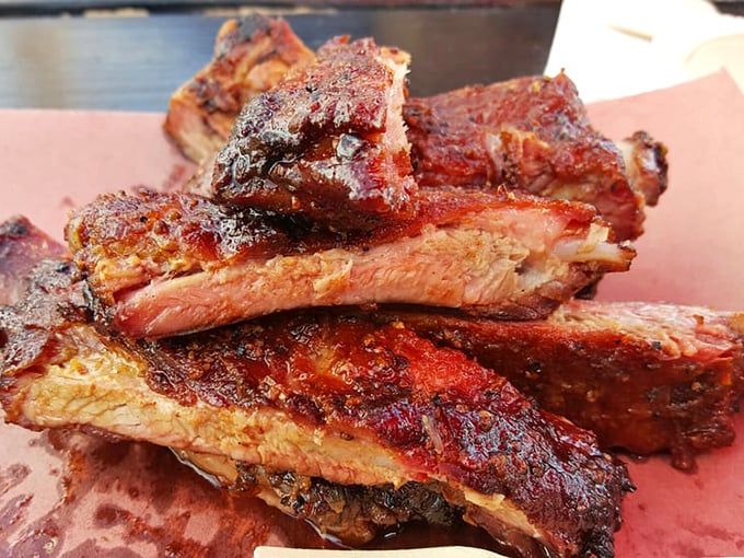 These ribs don't just fall off the bone—they practically leap into your mouth with that glistening, caramelized bark that dreams are made of.