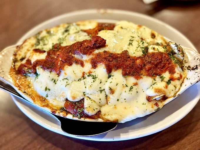 This isn't just baked pasta—it's a bubbling cauldron of cheese and sauce that would make any nonna weep with pride. Comfort food that hugs your soul.