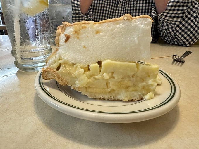 Behold the star attraction: banana creme pie so perfectly layered it could teach geology classes, with custard that defies gravity.